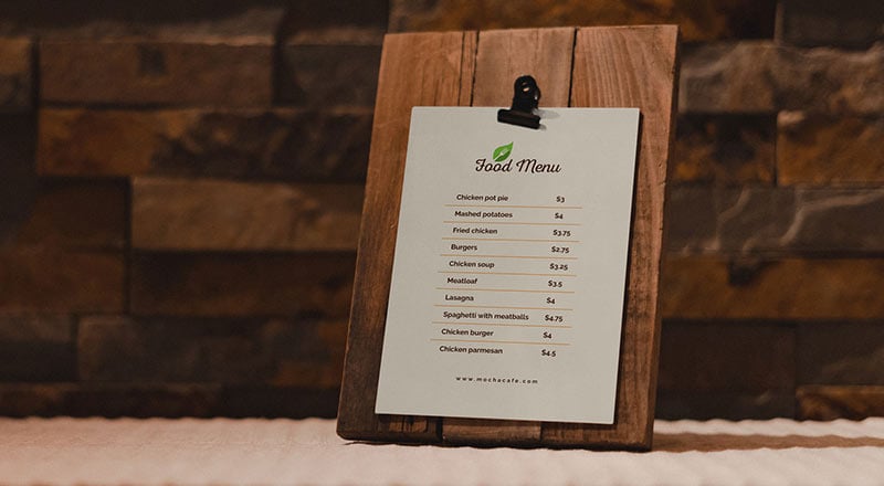Free Table Stand Menu Mockup PSD - Designbolts