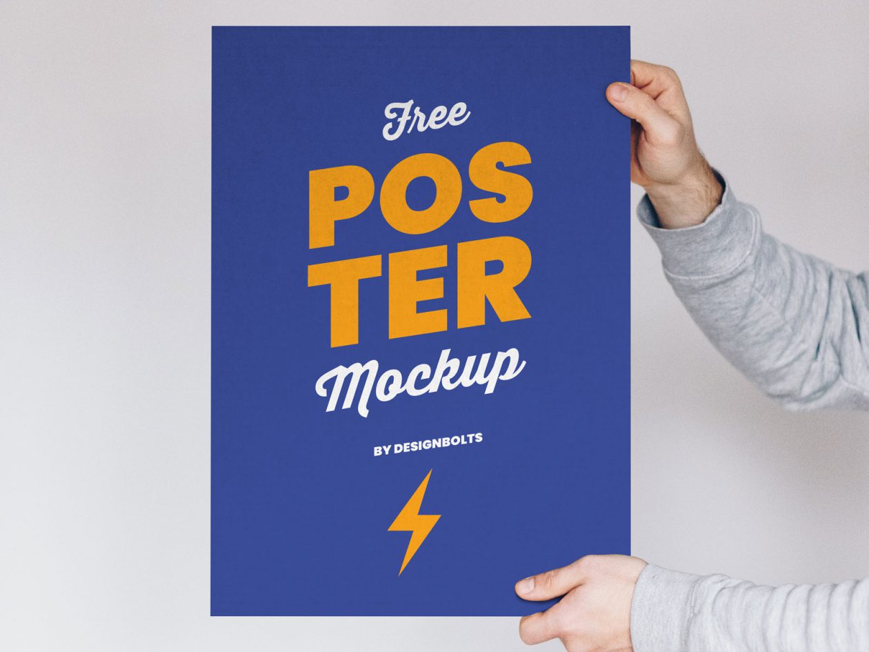 Free Hand Holding Poster Mockup PSD - Designbolts