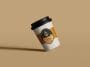 Free Tilted Paper Coffee Cup Mockup PSD - Designbolts