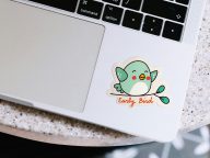 Free Laptop Sticker Mockup PSD - Designbolts